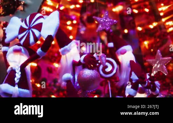 Multiple Santa Claus Christmas decorations moving in bubbles in the ...