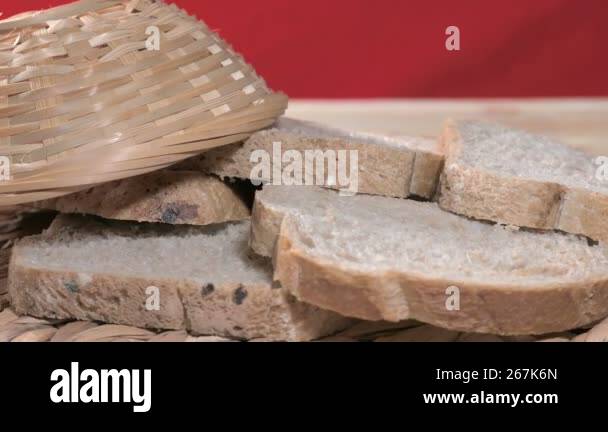 Slices of Bread Slide On The Wooden Table Stock Video Footage - Alamy