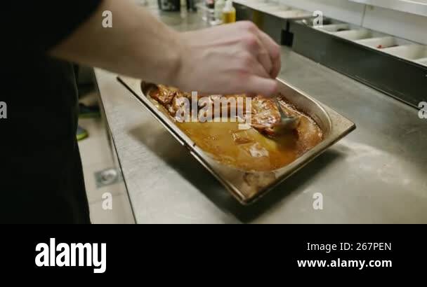 Process of Preparation of Meat Dishes by Chef Cook at Restaurant ...