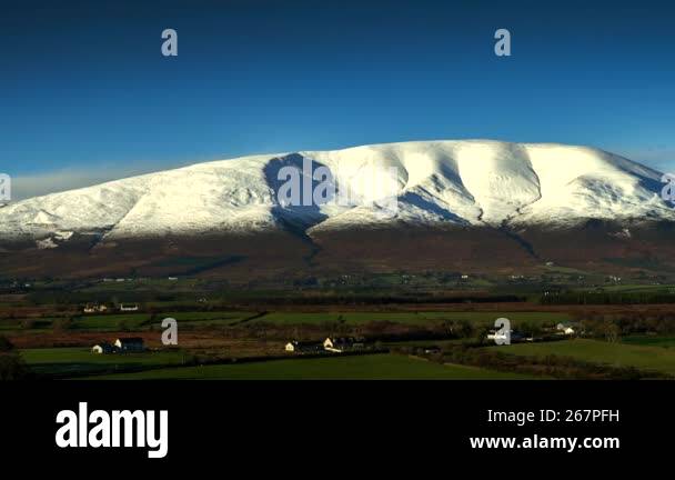 Scenery of an early morning when the sun rises over the Ireland Nephin ...