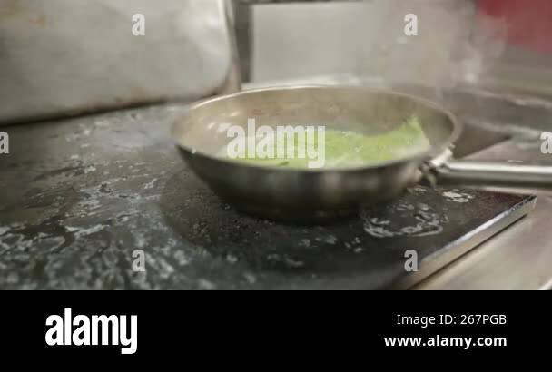 Preparation of Ravioli Dish by Chef Cook at Restaurant Kitchen. Slow ...