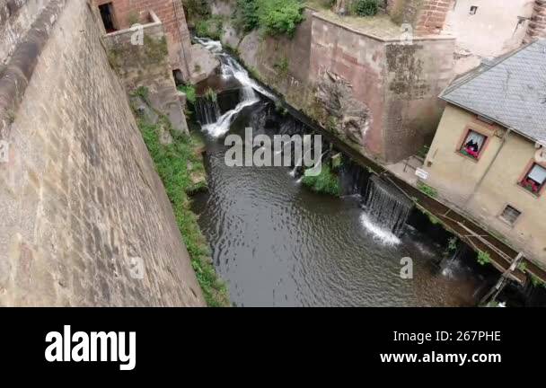 Traditional water mill building on the saar river in saarburg, germany ...