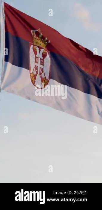 Serbia Belgrade Flag Vertical Cinematic Realistic Waving Dolly Out Blue ...