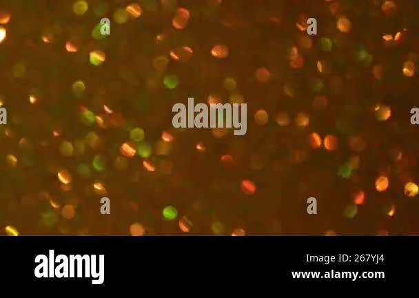 Move the mesmerizing golden shiny background to create a luxurious and ...