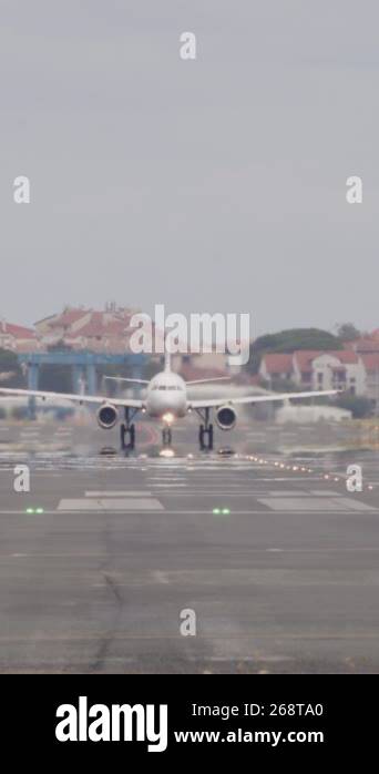Vertical video of an airplane taking off from the runway with landing ...
