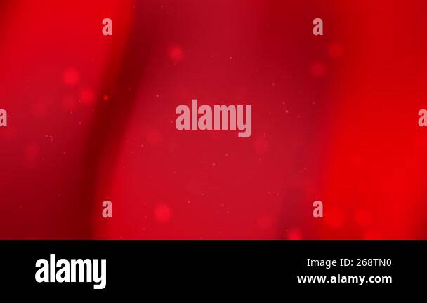 Red background with diffused light and bright particles, ideal for ...