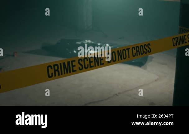 No people low-key shot of crime scene yellow barricade at murder scene ...