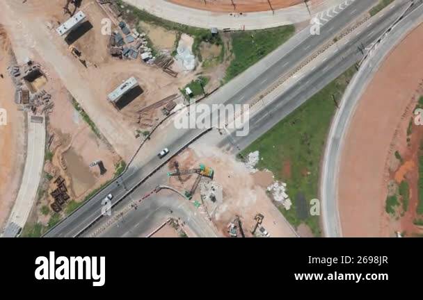 Aerial view drone footage of bridge construction being made across the ...