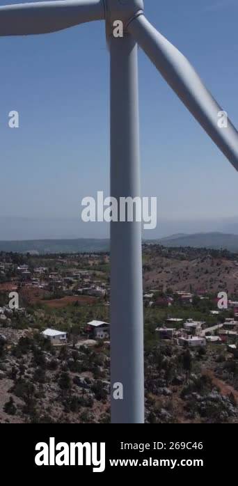 Wind panel installed on top of the mountain taken by drone, shot of a ...