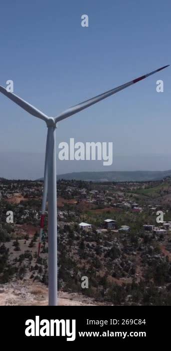 Aerial view of wind power plant sustainable energy shot with a drone ...