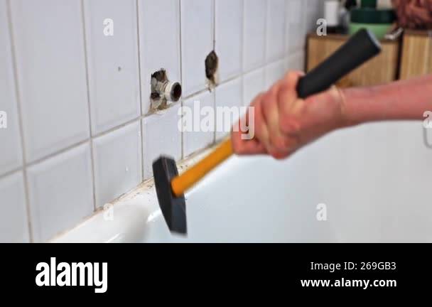 Hands of a young Caucasian man unrecognizable knocking with a yellow ...