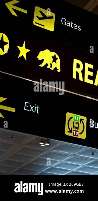 Illuminated airport signage displaying the Real ID compliance ...