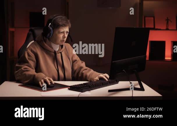 Woman gaming at home. Female gamer playing in online videogame on PC ...