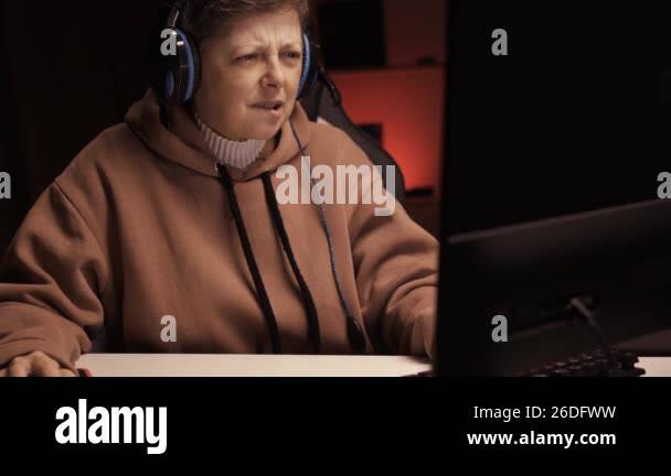 Woman gaming at home. Female gamer playing in online videogame on PC ...