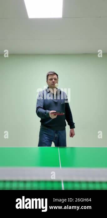 Table Tennis Player Practicing Serve Preparation with Paddle Bounce ...