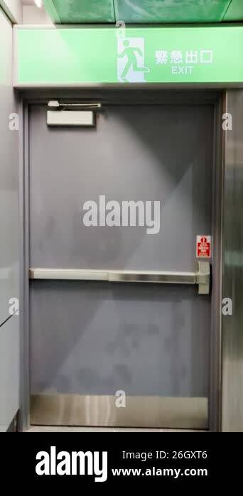 Safety First: Exit Signage Above MRT Security Gate Stock Video Footage ...