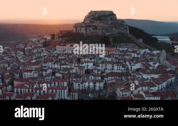 Aerial view of historic medieval town of Morella during sunset ...
