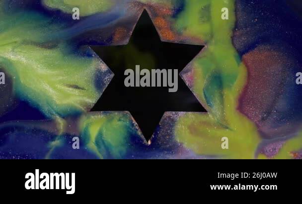 Star outline. Paint background. Defocused blue green multicolor ...