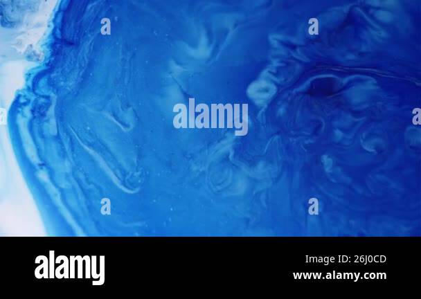 Marbling enamel. Paint emulsion. Art blue blobs spill on surface ...
