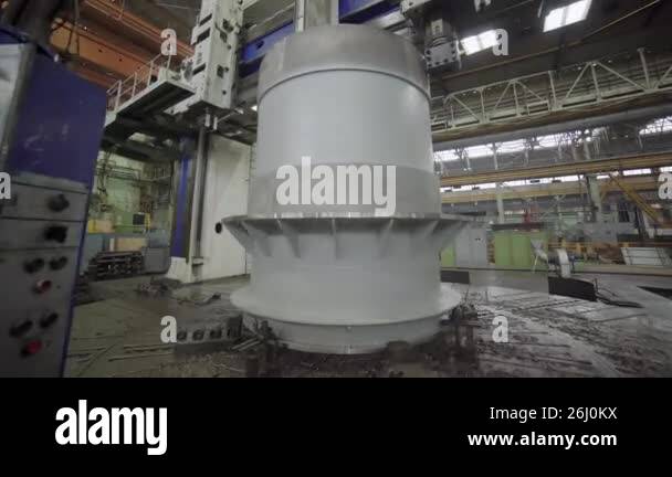 A complex industrial machine in manufacturing, demonstrating ...