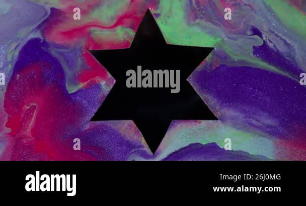 Ink star. Paint flow sparkle. Defocused blue green multicolor black ...