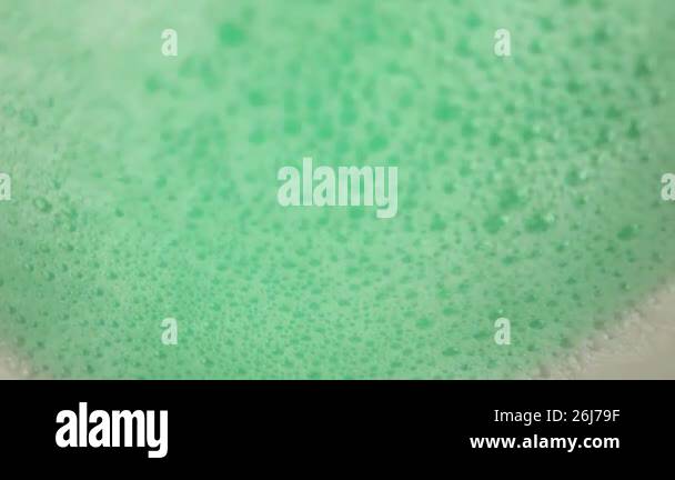 Swirling surface of bubbles and rocking surface with bubbles. Waving ...