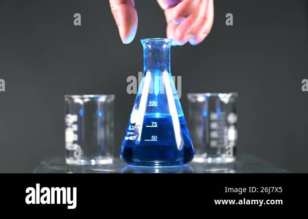 Chemical experiment with colorful solutions. Formulation, cure ...