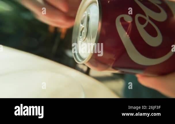 This closeup shot of a soda can beautifully showcases the intricate ...