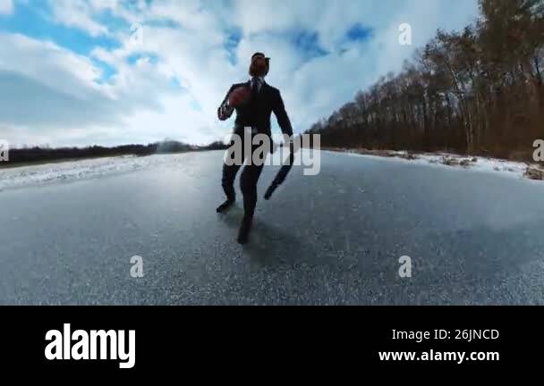 Footage of young good-looking man in black suit on way to work on ...