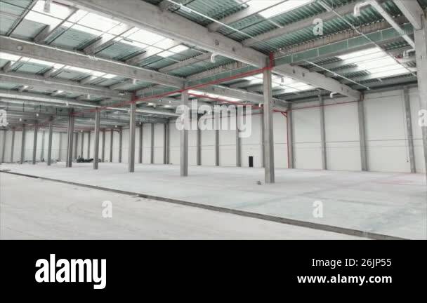 Footage of bright modern logistics warehouse inside. Drone view of ...