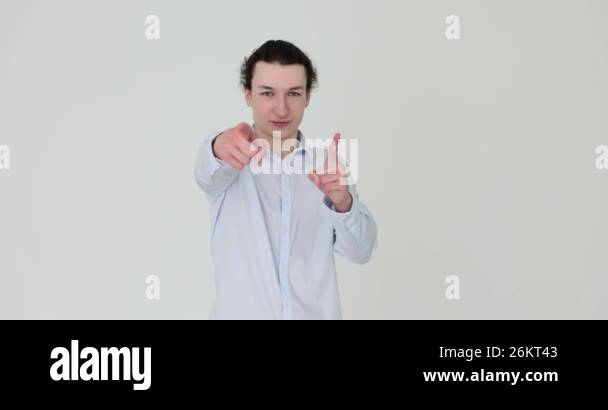Young man demonstrates hand sign language gesture chooses you. Man ...