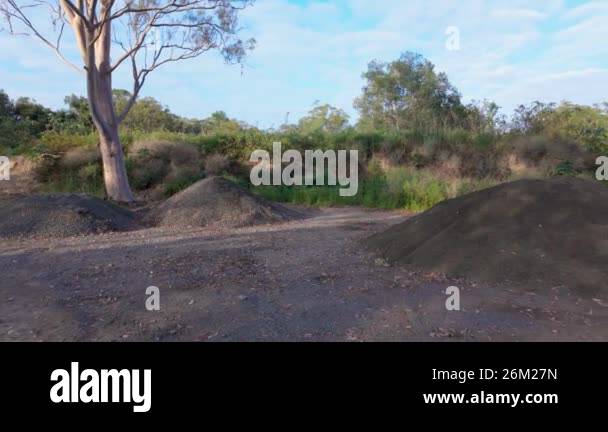 Video of gravel and rock piles used for road works, civil works, and ...