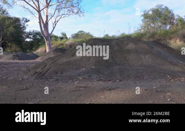 Video of gravel and rock piles used for road works, civil works, and ...