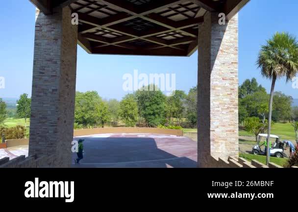 Person walking near golf course entrance Stock Video Footage - Alamy