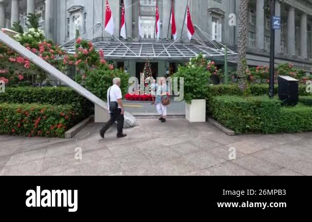 People posing and walking by a grand building Stock Video Footage - Alamy