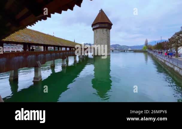 The medieval covered wooden Kapellbrucke (Chapel Bridge) footbridge ...