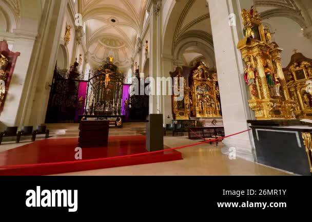 The elegant historic interior of St Leodegar Church with tall stone ...