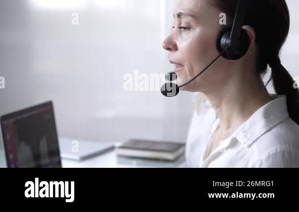 Female call center operators in assisting clients online, providing customer support and ...