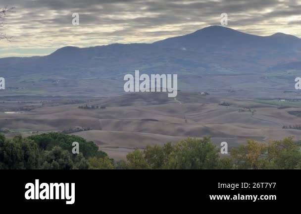 Idyllic view of the Tuscan countryside featuring rolling hills, autumn ...