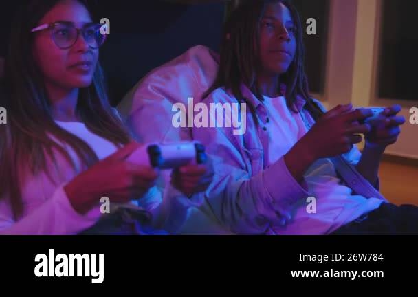 Influencer gamer couple playing games with joystick live streaming on ...