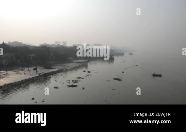 Misty morning view of Hooghly River from Howrah Bridge in Kolkata, West ...