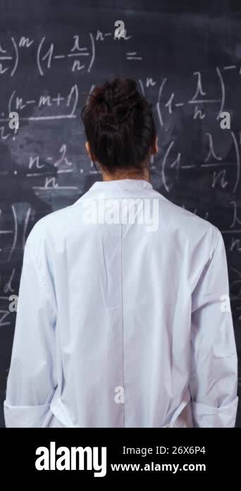 Pretty handsome attractive woman student or teacher in white robe ... Pretty handsome attractive woman student or teacher in white robe ...
