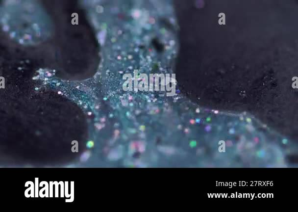 Shimmering oil. Ink fluid. Defocused blue black color holographic ...