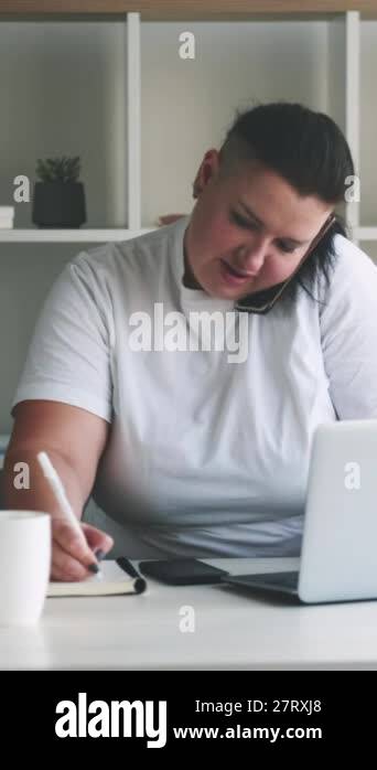 Vertical video. Multitask work. Busy secretary. Tireless overweight ...