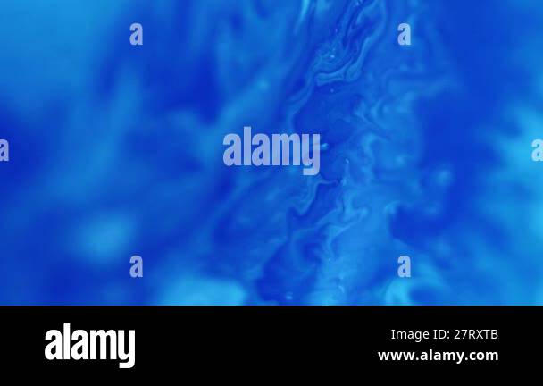 Ink spreading. Acrylic fluid. Defocused blue color emulsion liquid ...