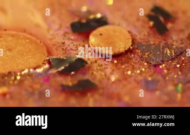 Sparkling gel texture. Shimmering liquid. Blur golden color metallic ...