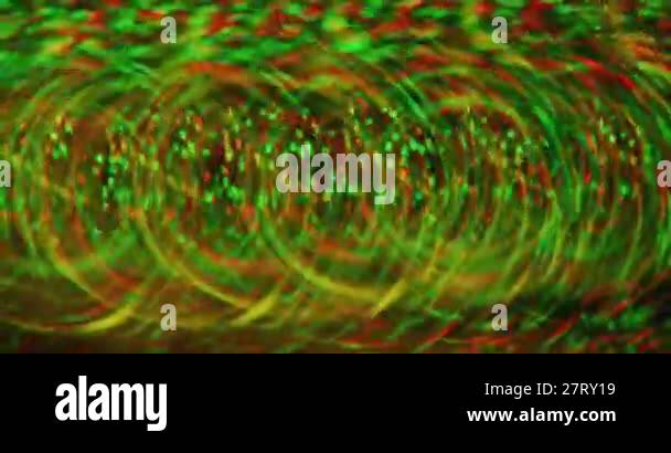 Blur light sparkles. Defocused beam. Yellow green red colorful ...