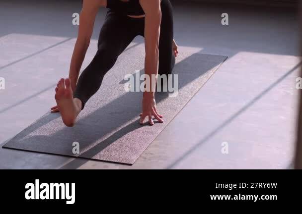 Morning pilates. Split exercise. Fit woman in activewear practice yoga ...