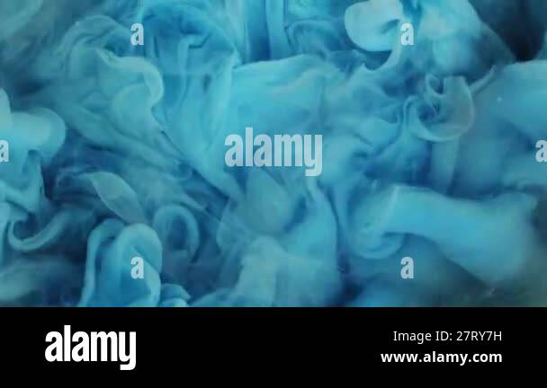 Fantasy fog. Color water. Light blue dye spill underwater explosion art ...