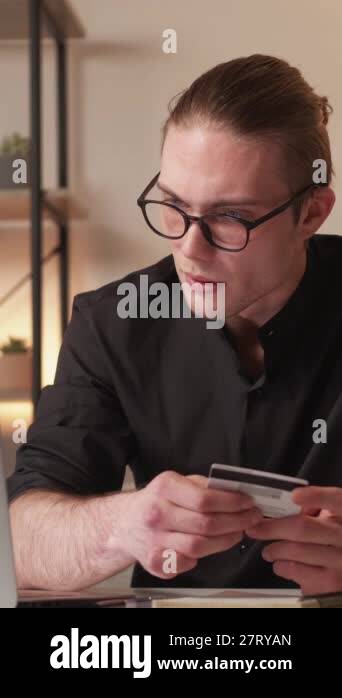 Vertical video. Online transaction. Active money. Serious business man ...